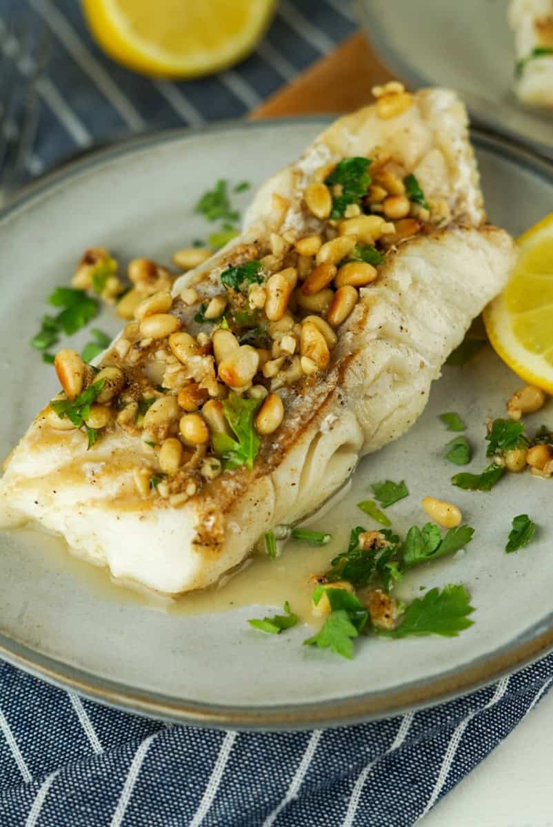 Lemon Garlic Fish and Toasted Pine Nuts - It Starts With Good Food